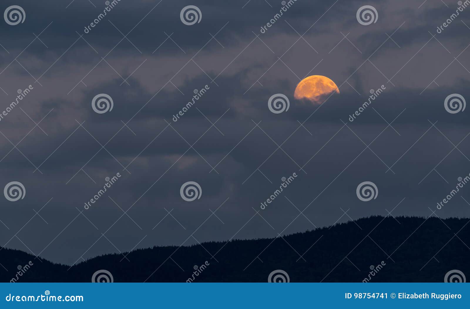Full Moon Rising Behind Clouds Stock Image - Image of dusk, space: 98754741