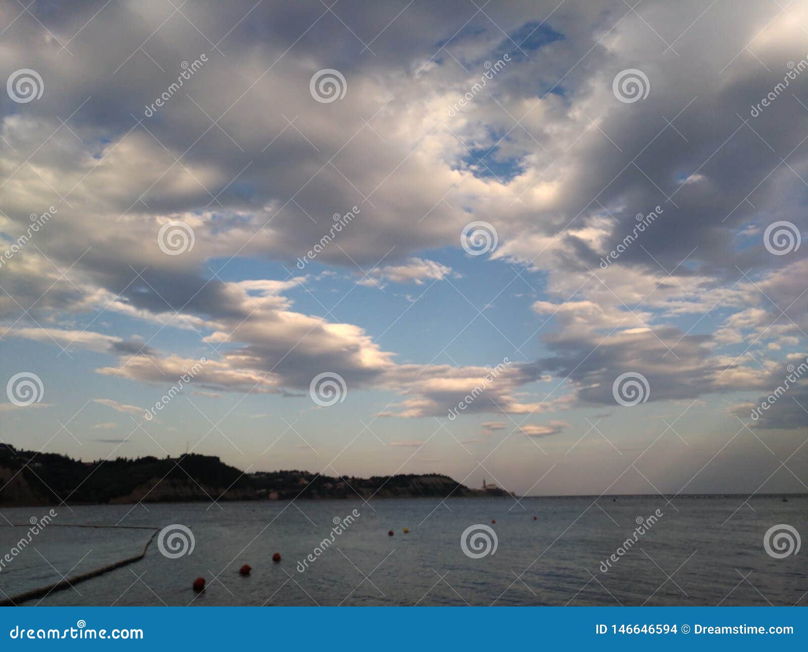 Clouds over the beach stock photo. Image of clouds, piran - 146646594