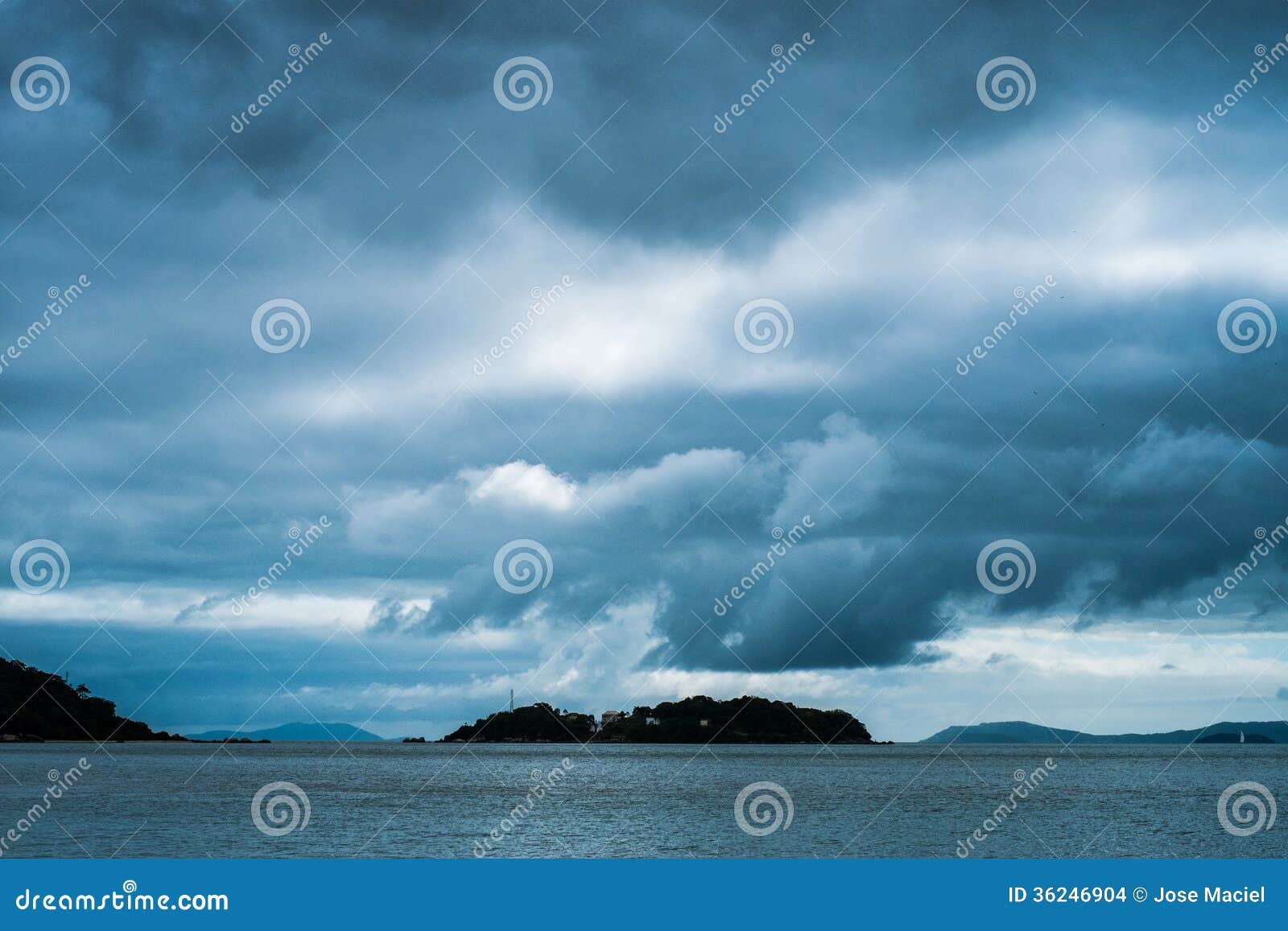 Clouds over an island stock photo. Image of cloud, weather - 36246904