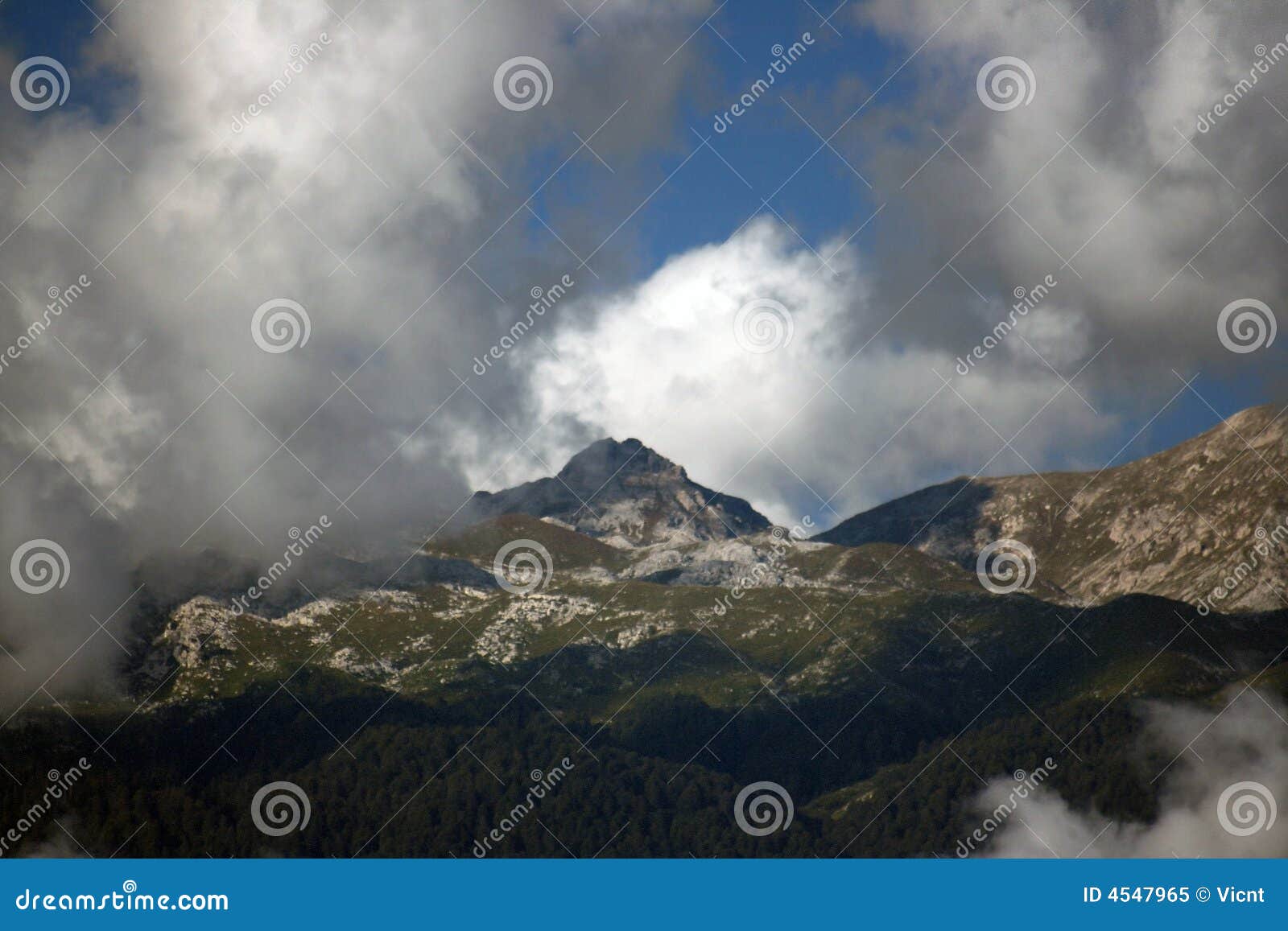 Clouds over mountain stock image. Image of forest, tree - 4547965