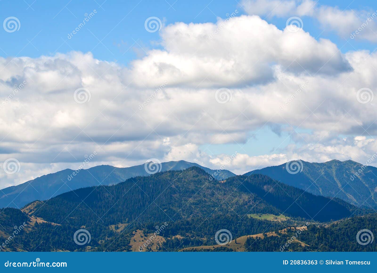 Clouds over mountain peaks stock image. Image of tranquility - 20836363