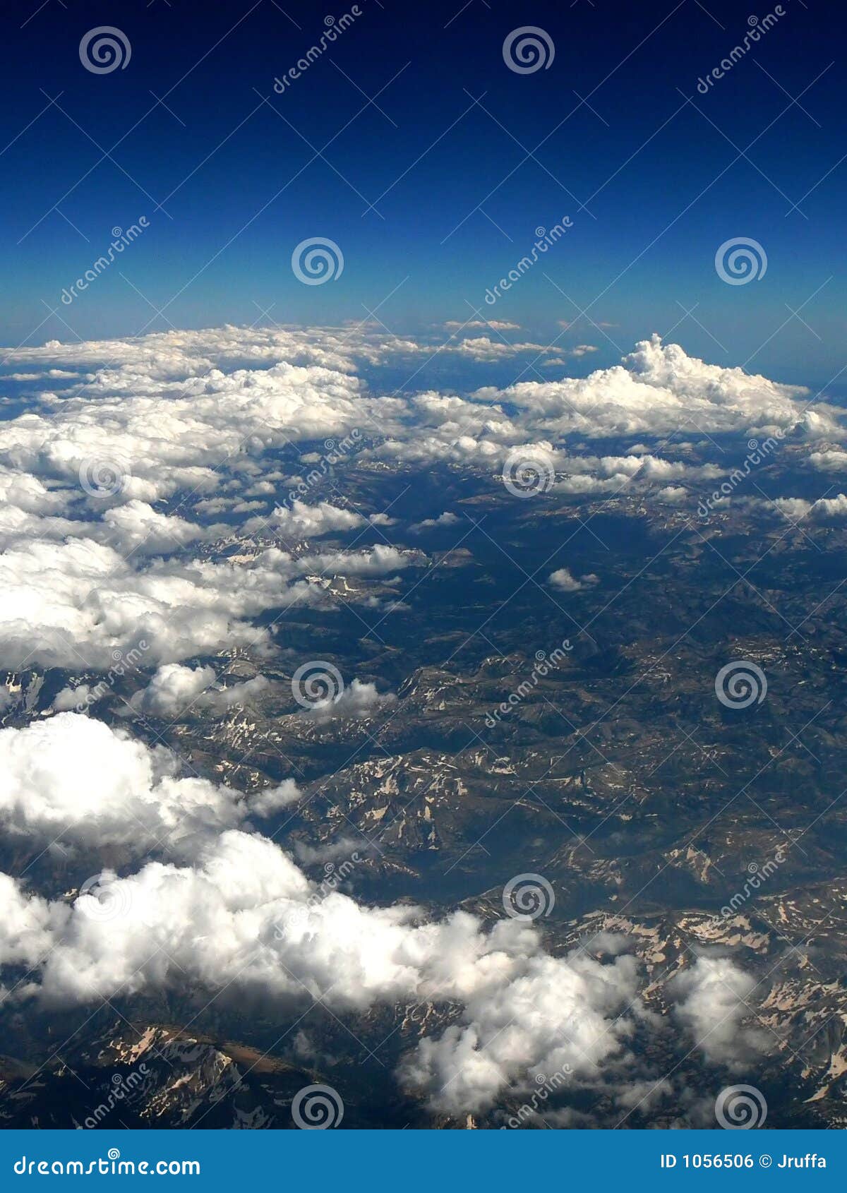 Clouds over mountains stock photo. Image of cover, airplane - 1056506