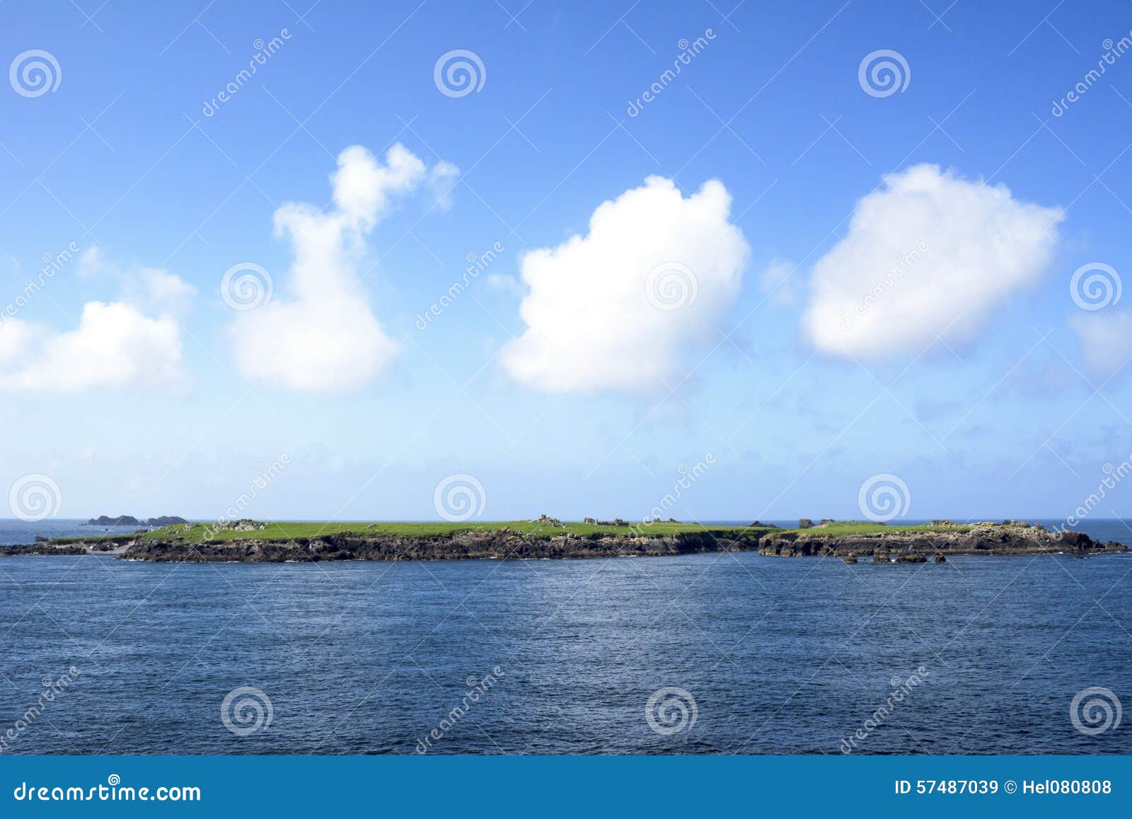 Clouds Over Small Island on Bright Sunny Day in Ireland. White Fluffy ...