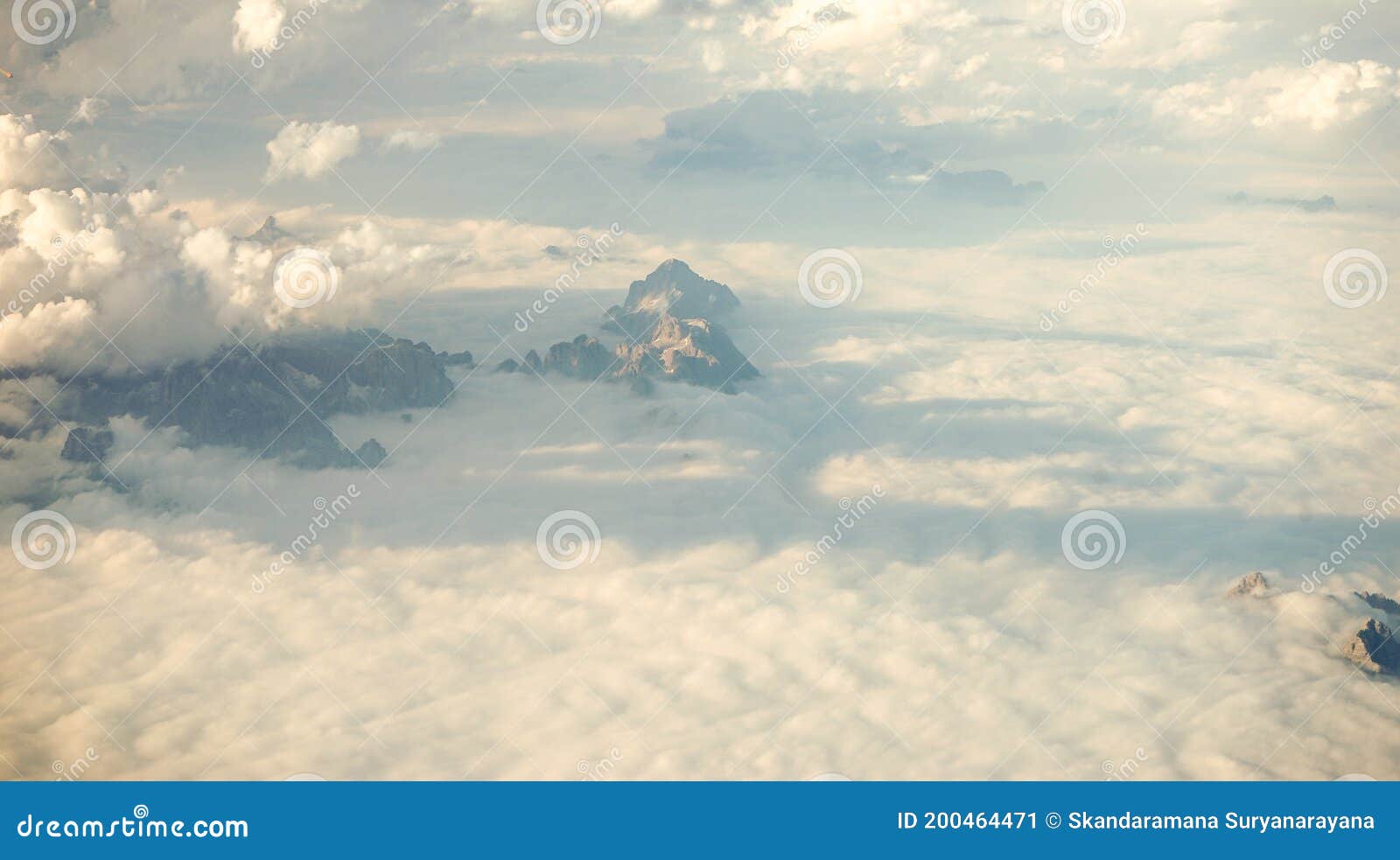 Clouds Over Snow Clad Austrian Alps Mountains Seen from an Airplane ...