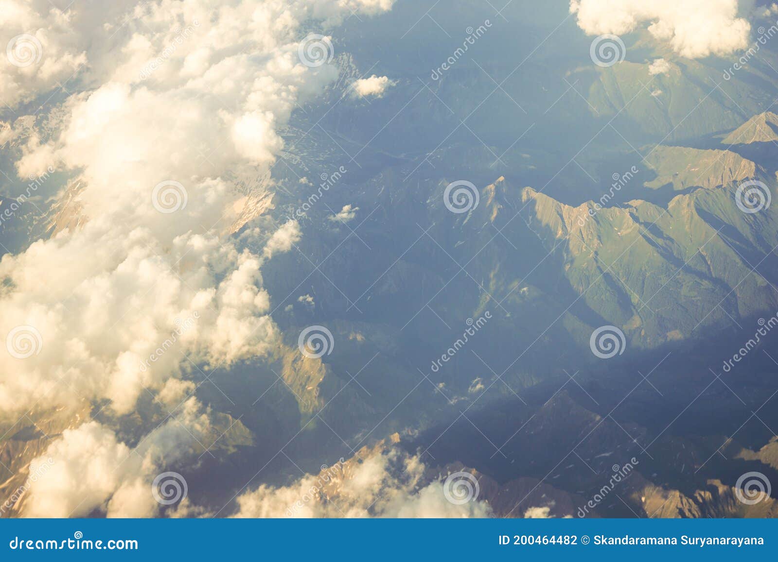 Clouds Over Snow Clad Austrian Alps Mountains Seen from an Airplane ...