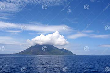 Clouds Over Volcanic Island Stock Image - Image of eruption, oceania ...