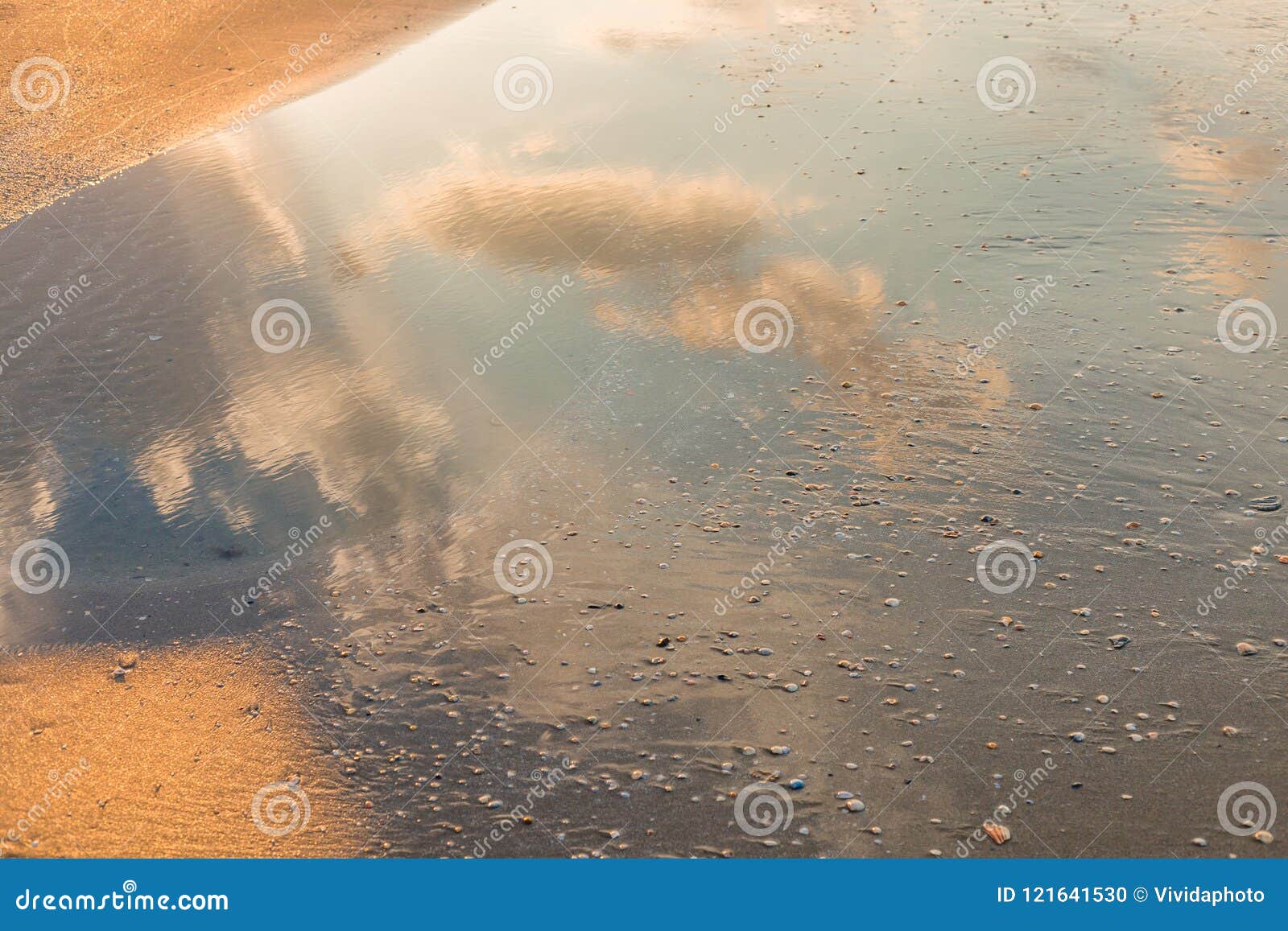 Clouds in Puddle on the Beach Stock Photo - Image of summer, footprints ...