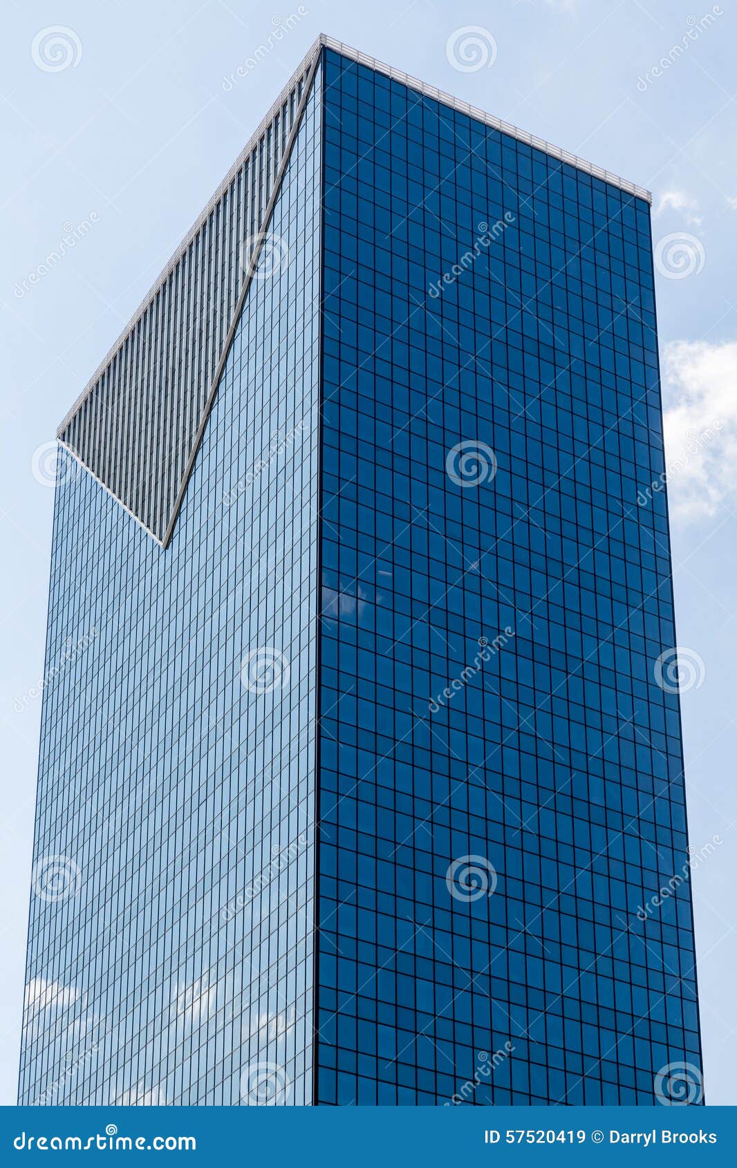 Clouds Reflected in Blue Tower Wtih Triangle Design Stock Image - Image ...