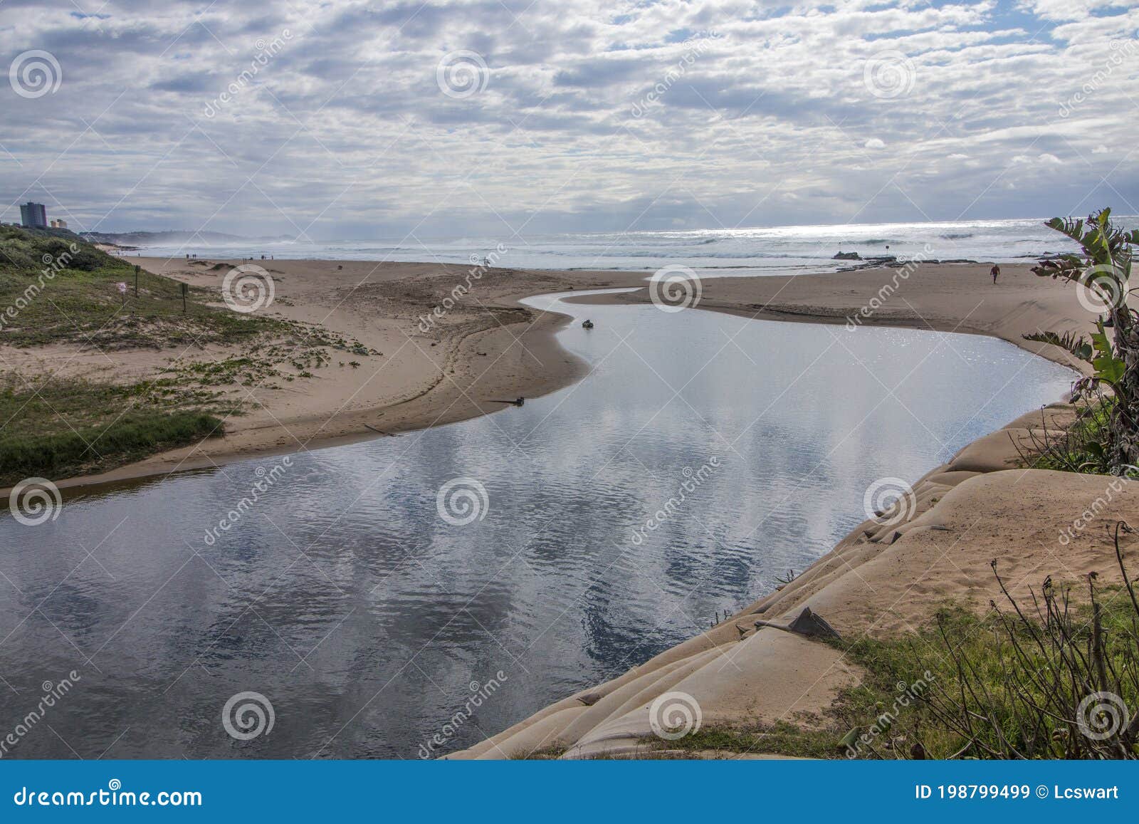 Clouds Reflecting on River Flowing into the Sea Stock Image - Image of ...