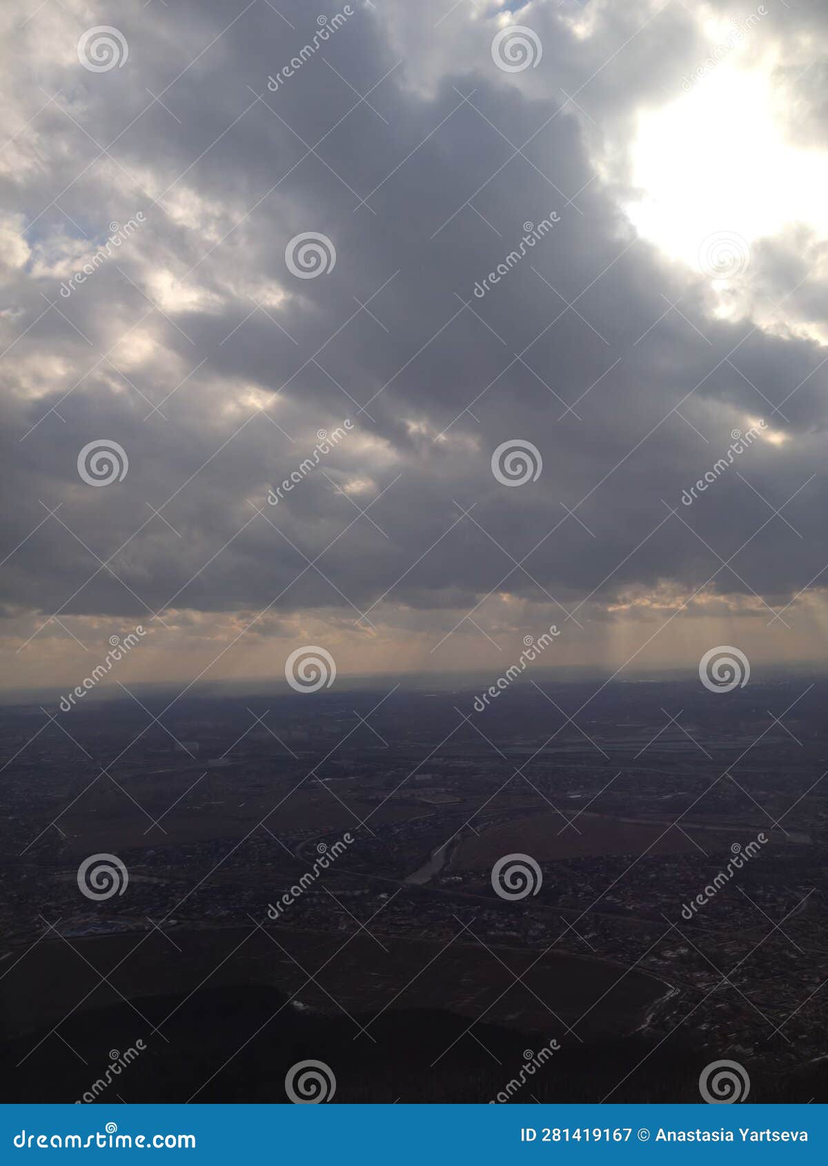 View from the Plane. Bird S-eye View. Sunlight through Clouds. Clouds ...