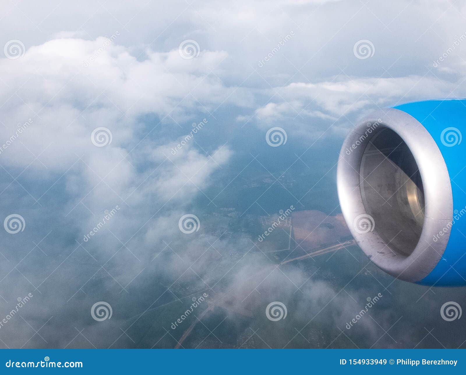 Clouds,roads and Fields, Engine and Wing of Plane. Aerial View from ...