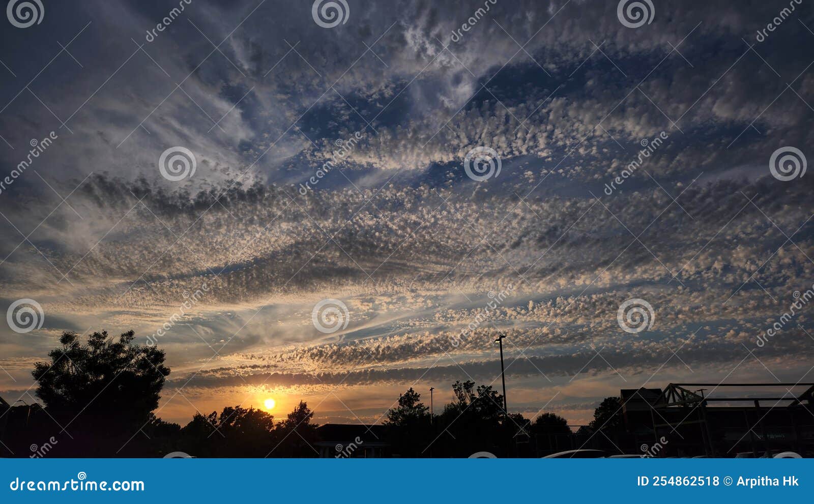 Clouds Running Towards Setting Sun Stock Photo - Image of evening ...