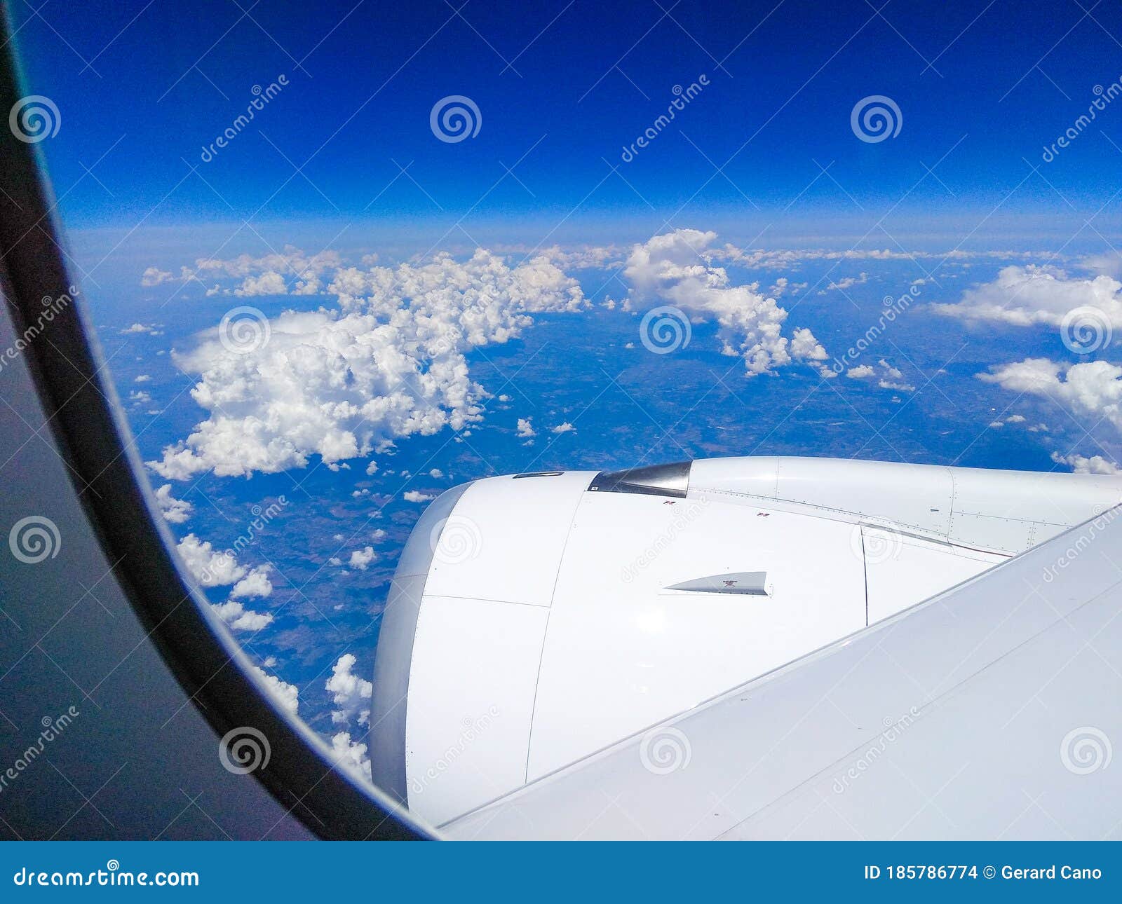 Clouds and Sky Seen through an Airplane Window Stock Photo - Image of ...