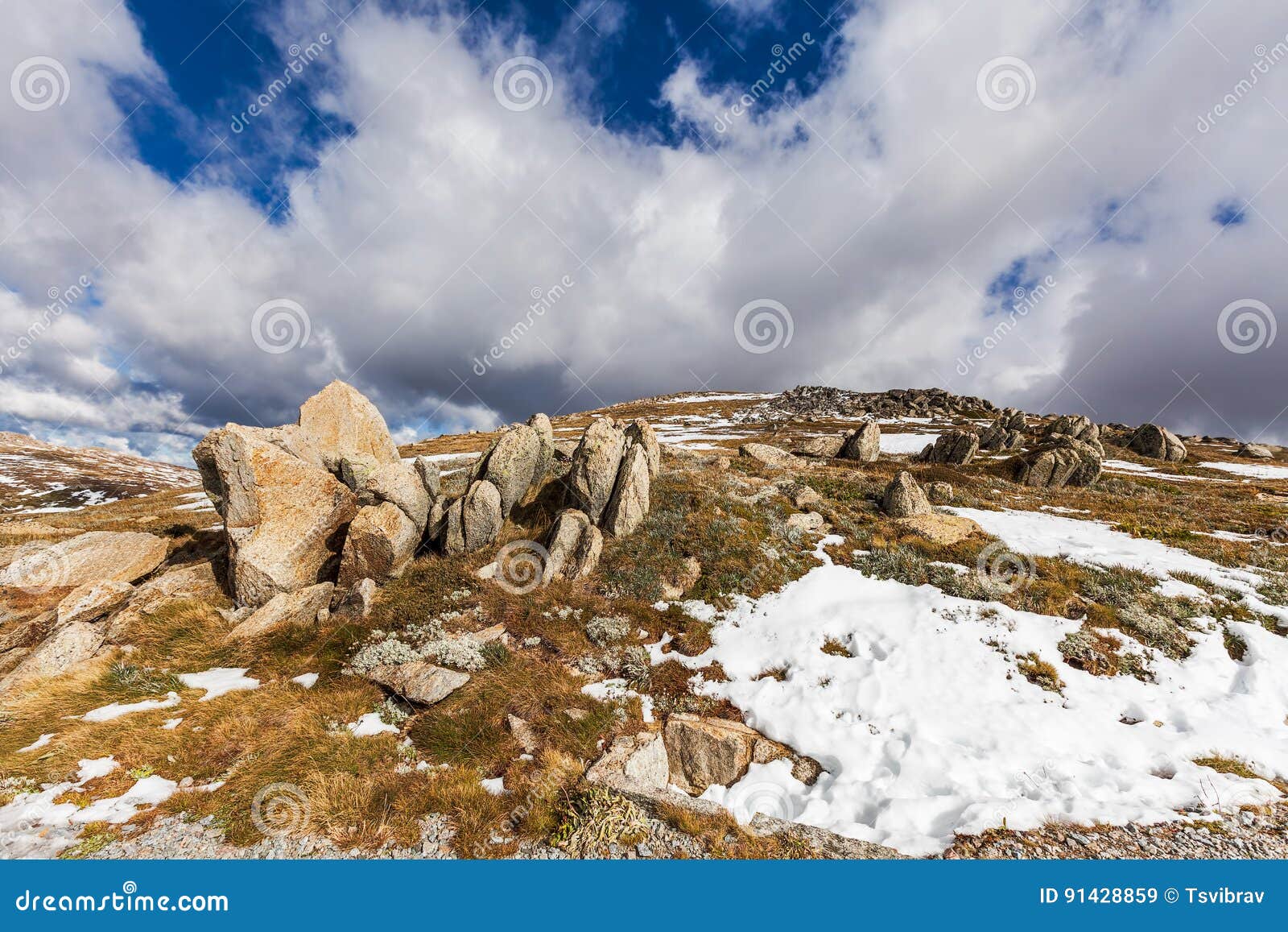 Clouds, Snow, and Rocks of Australian Alps. Stock Image - Image of ...