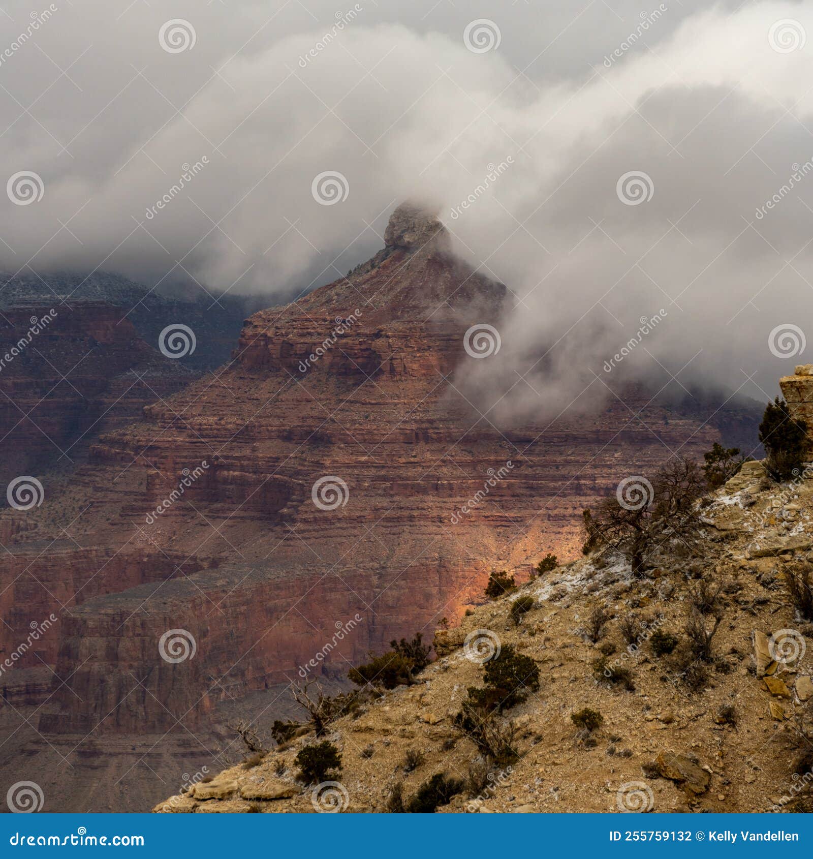 Clouds Wrap Around the Pyramids in Grand Canyon Stock Photo - Image of ...
