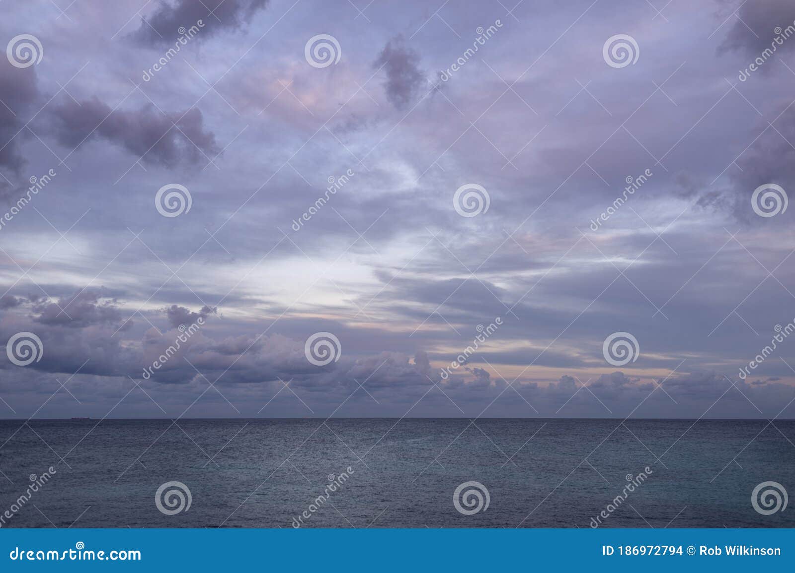 Cloudscape over the ocean stock photo. Image of peaceful - 186972794