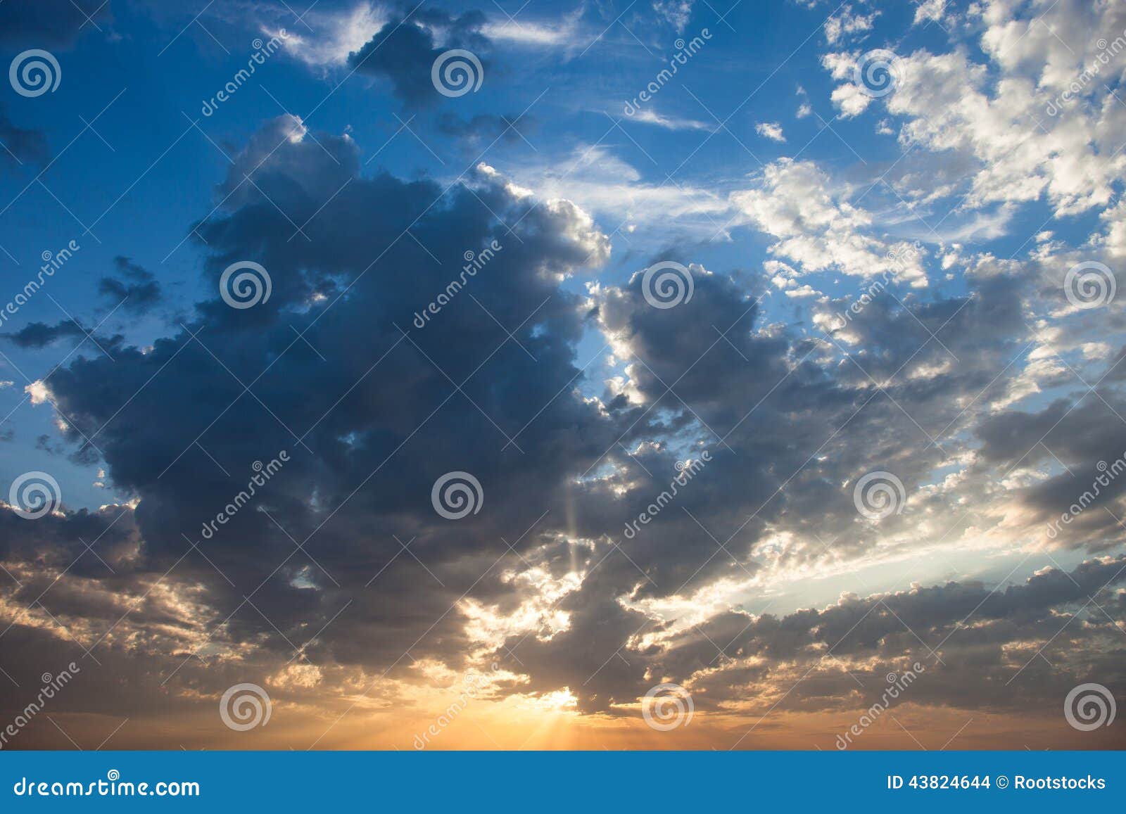 Cloudscape with the Sun Rays Radiating from Behind the Cloud Stock ...