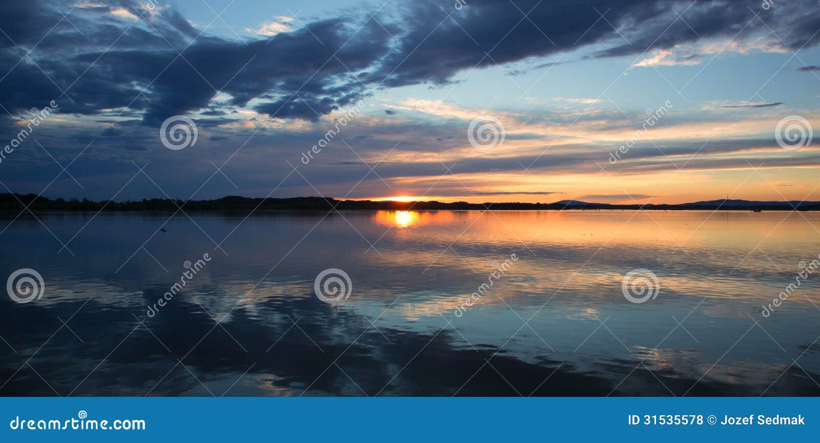 Cloudscape by Sunset Over Dam Stock Photo - Image of light, brightly ...