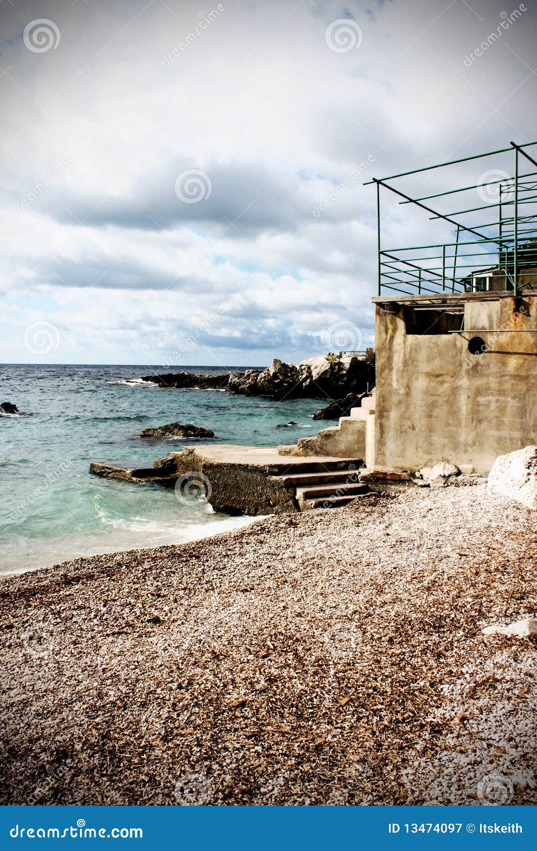 Cloudy beach stock image. Image of rocks, beach, stairs - 13474097