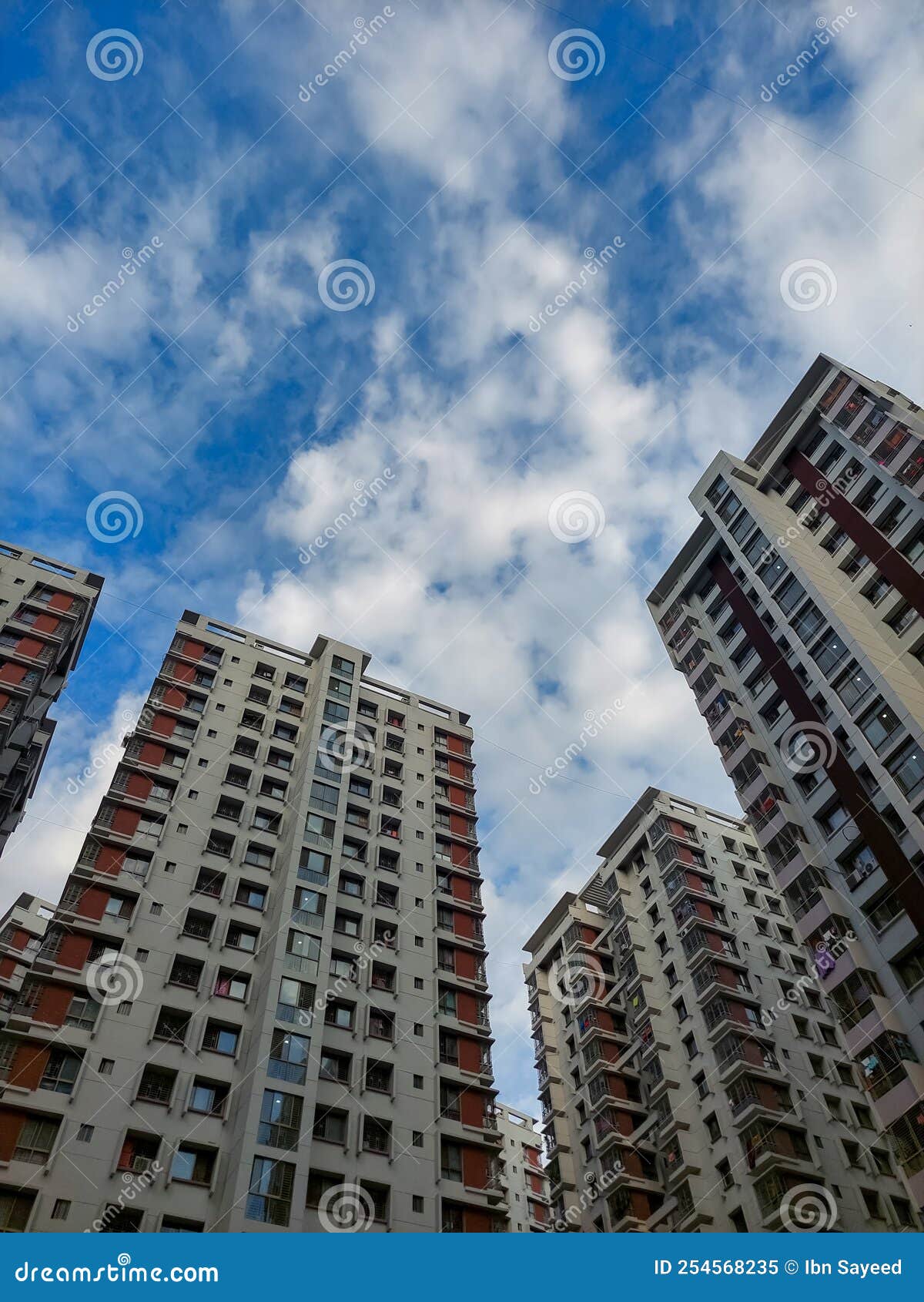 Cloudy Blue Sky in the Gap of High Raise Building Stock Image - Image ...