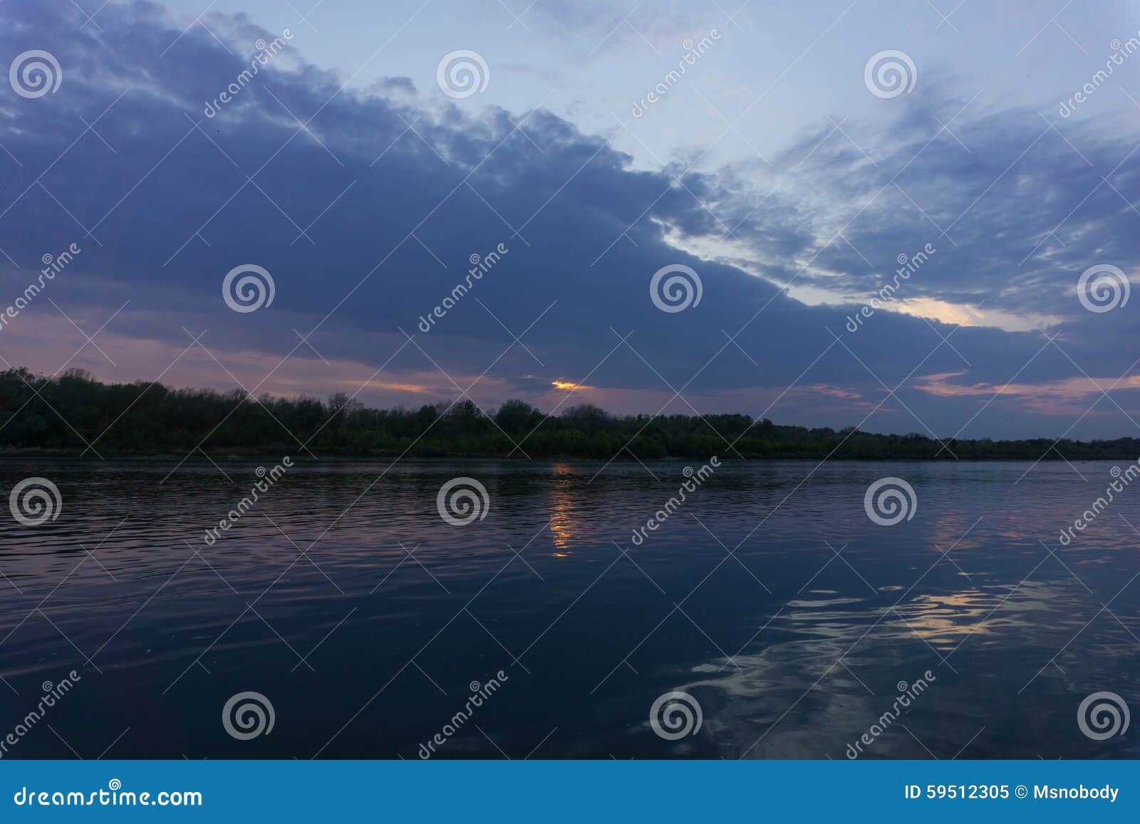 Cloudy Dramatic Sunset Over Water Stock Image - Image of landscape ...
