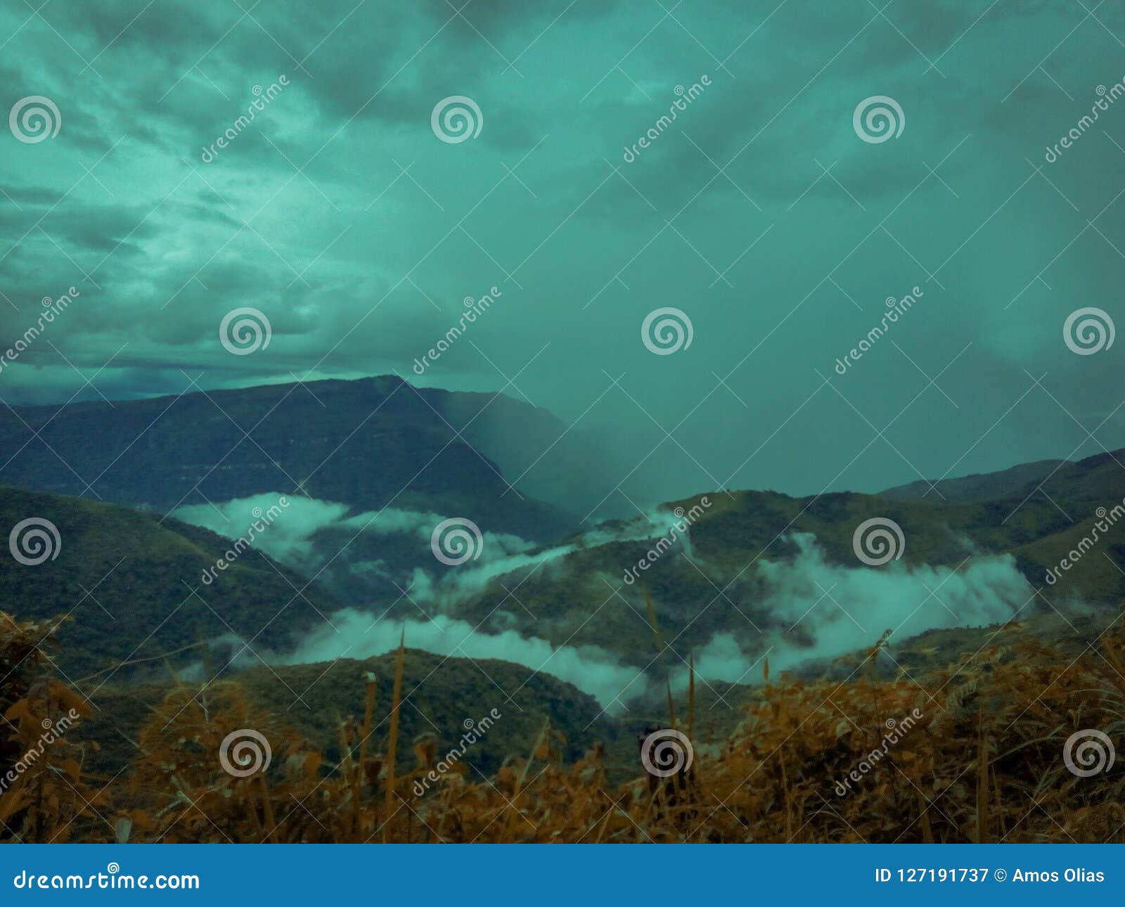 Cloudy fields stock image. Image of cloudy, clouds, hilly - 127191737