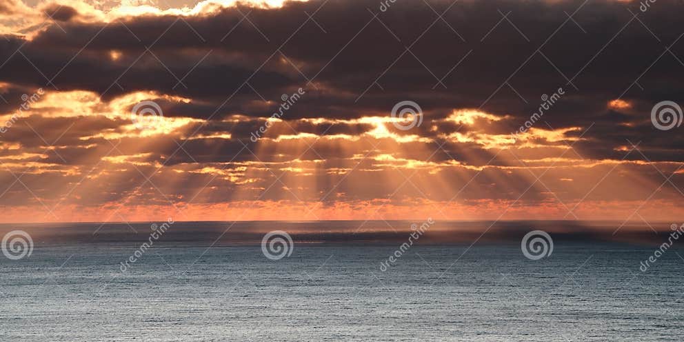Cloudy sea sunrise stock image. Image of ocean, light - 22002375