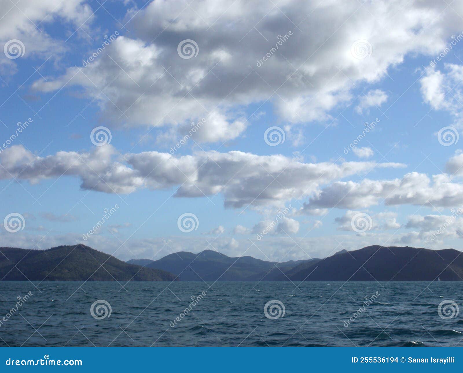Cloudy sky and ocean waves stock photo. Image of cloud - 255536194