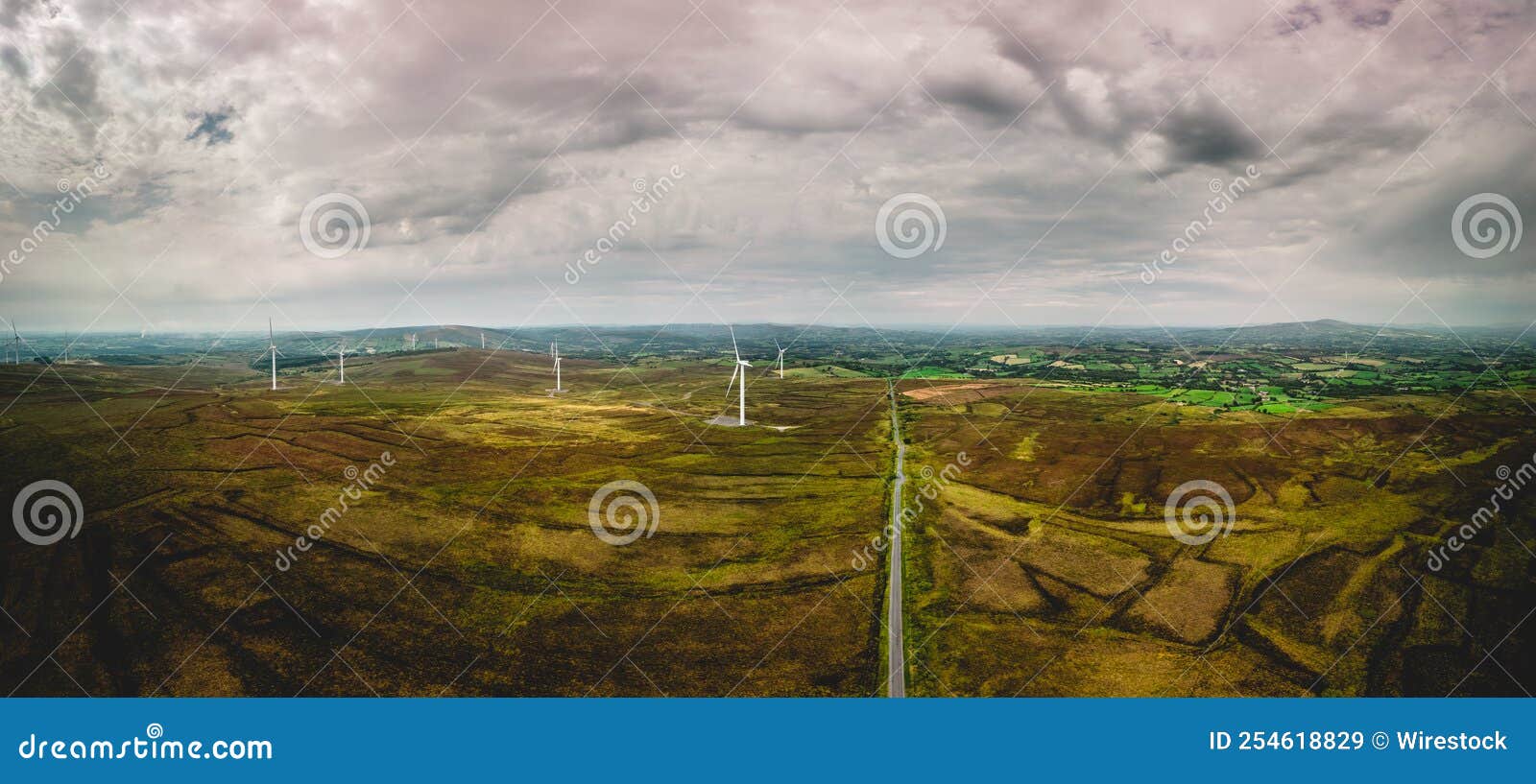 Cloudy Sky Over Farm of Wind Turbines, Ireland Stock Image - Image of ...