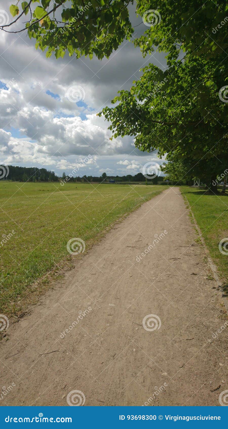 Cloudy sky over path stock photo. Image of diatomite - 93698300