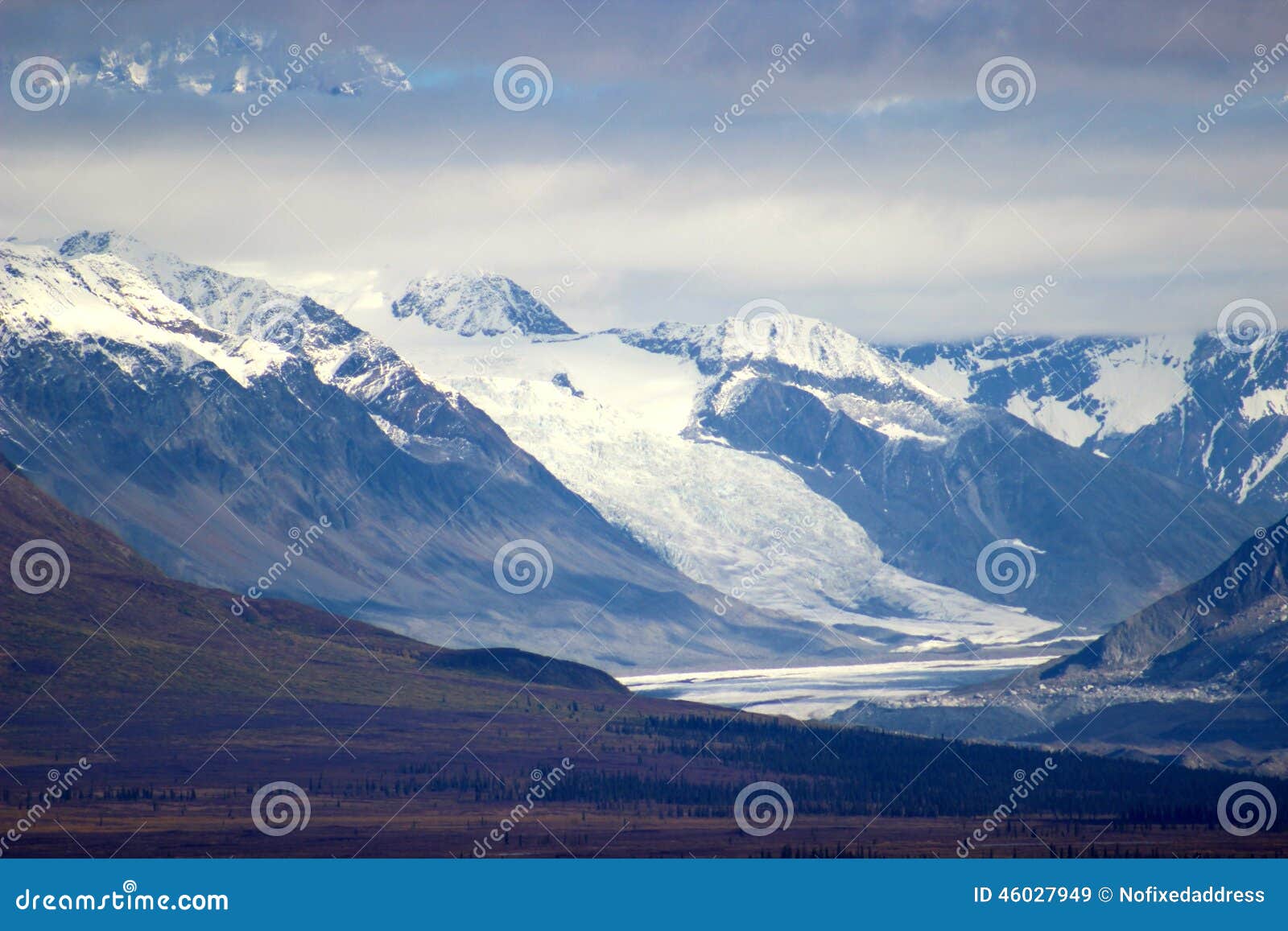 CLOUDY SKY with SNOWY MOUNTAINS and FALL TUNDRA. Stock Image - Image of ...