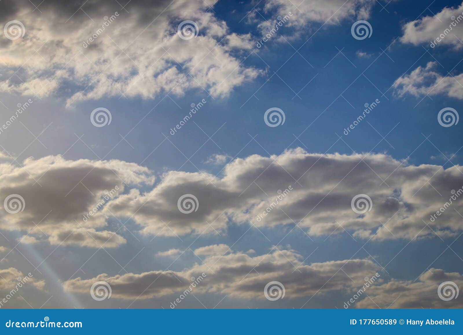 Cloudy sky in a spring day stock image. Image of blue - 177650589