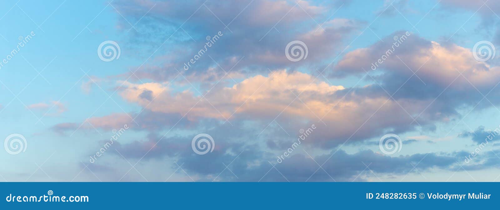 Cloudy Sky at Sunset, Sunlit Clouds in the Blue Sky Stock Image - Image ...