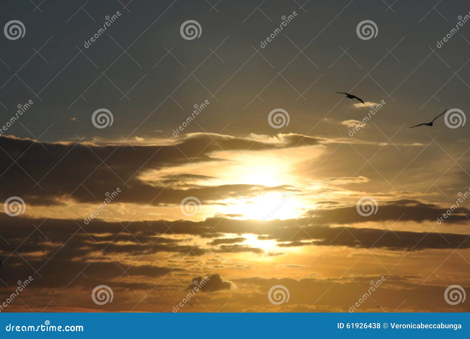 Cloudy sunset stock photo. Image of outdoor, clouds, sundown - 61926438