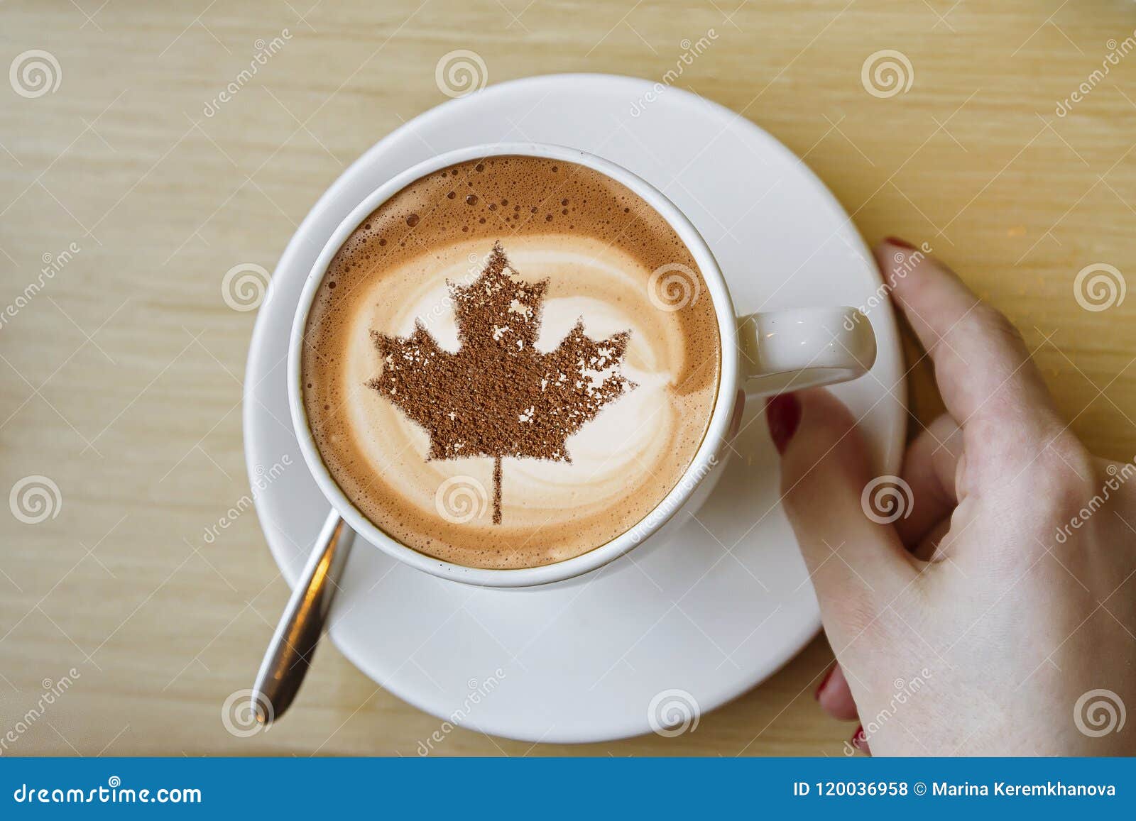 Clover on a cup of coffee stock photo. Image of fall - 120036958