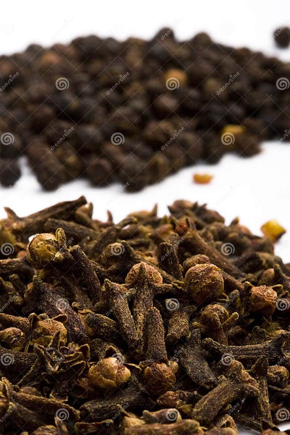 Cloves and black pepper stock image. Image of peppercorns - 12043183