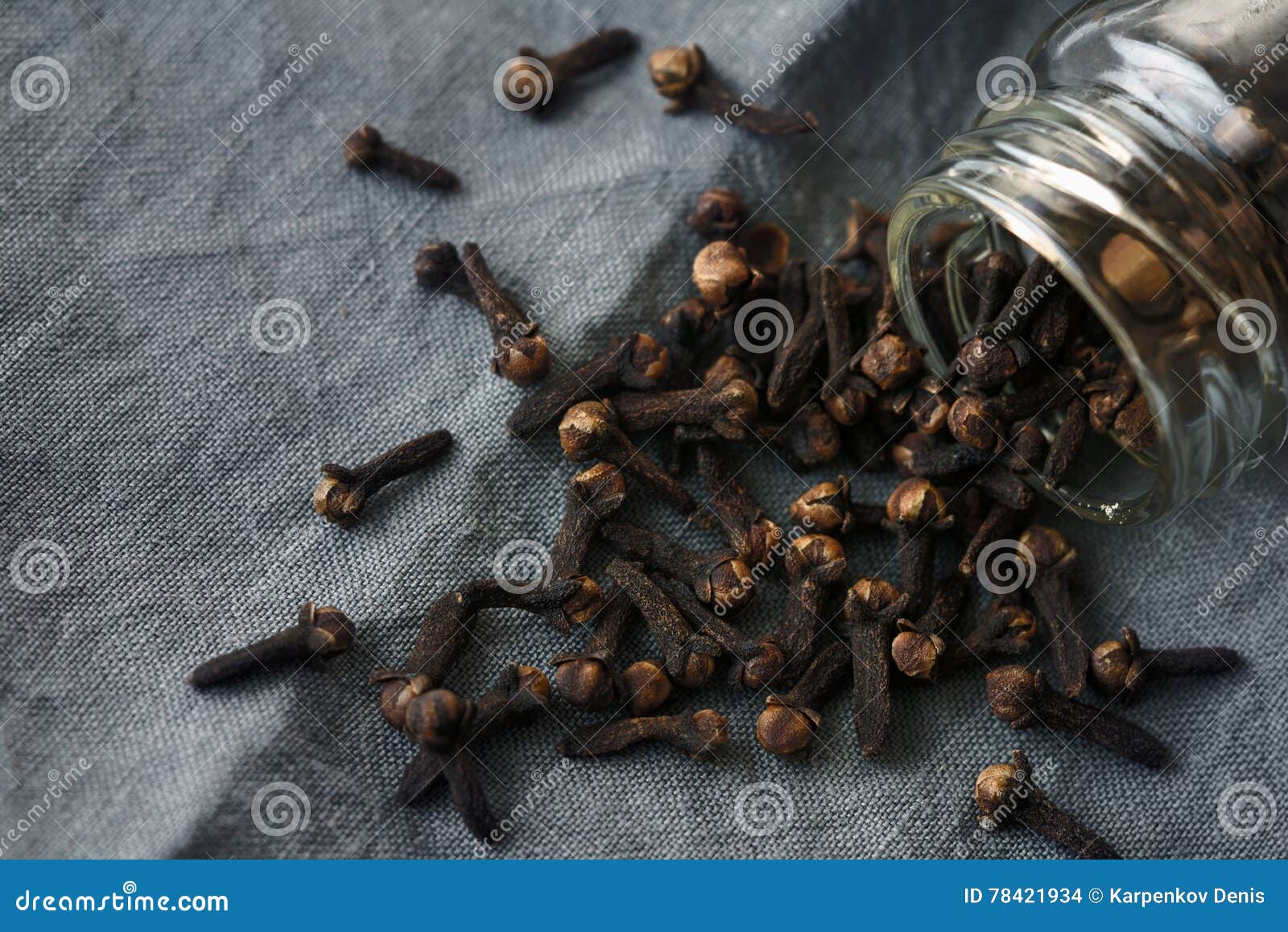 Cloves in the Glass Jar on the Grey Cloth Stock Photo - Image of brown ...