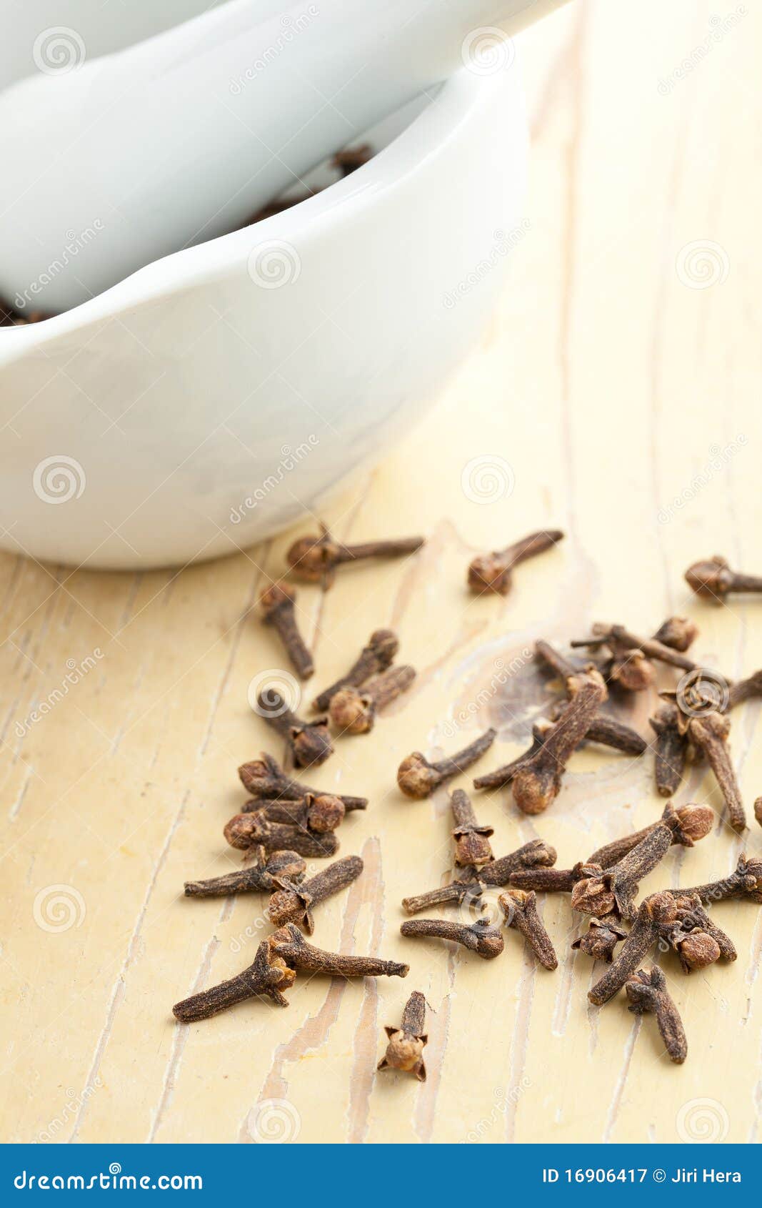 Cloves on kitchen table stock image. Image of natural - 16906417