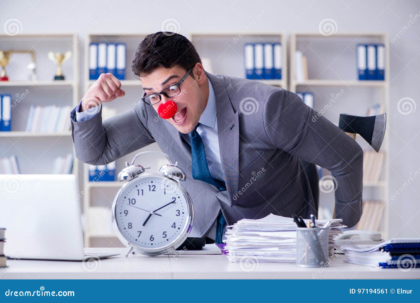 The Clown Businessman in the Office with an Axe and an Alarm Clock ...