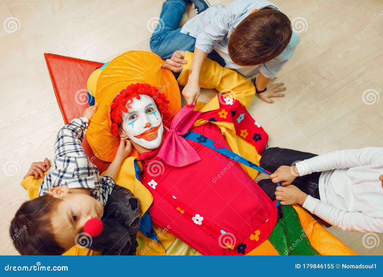 Clown and Children Pull Hands into the Camera Stock Image - Image of ...