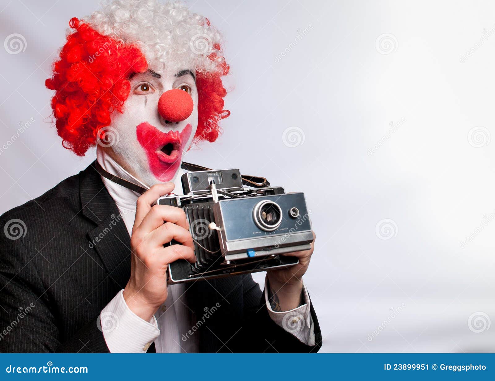 Clown Der Sofortigen Kamera Stockbild - Bild von dumm, liebling: 23899951