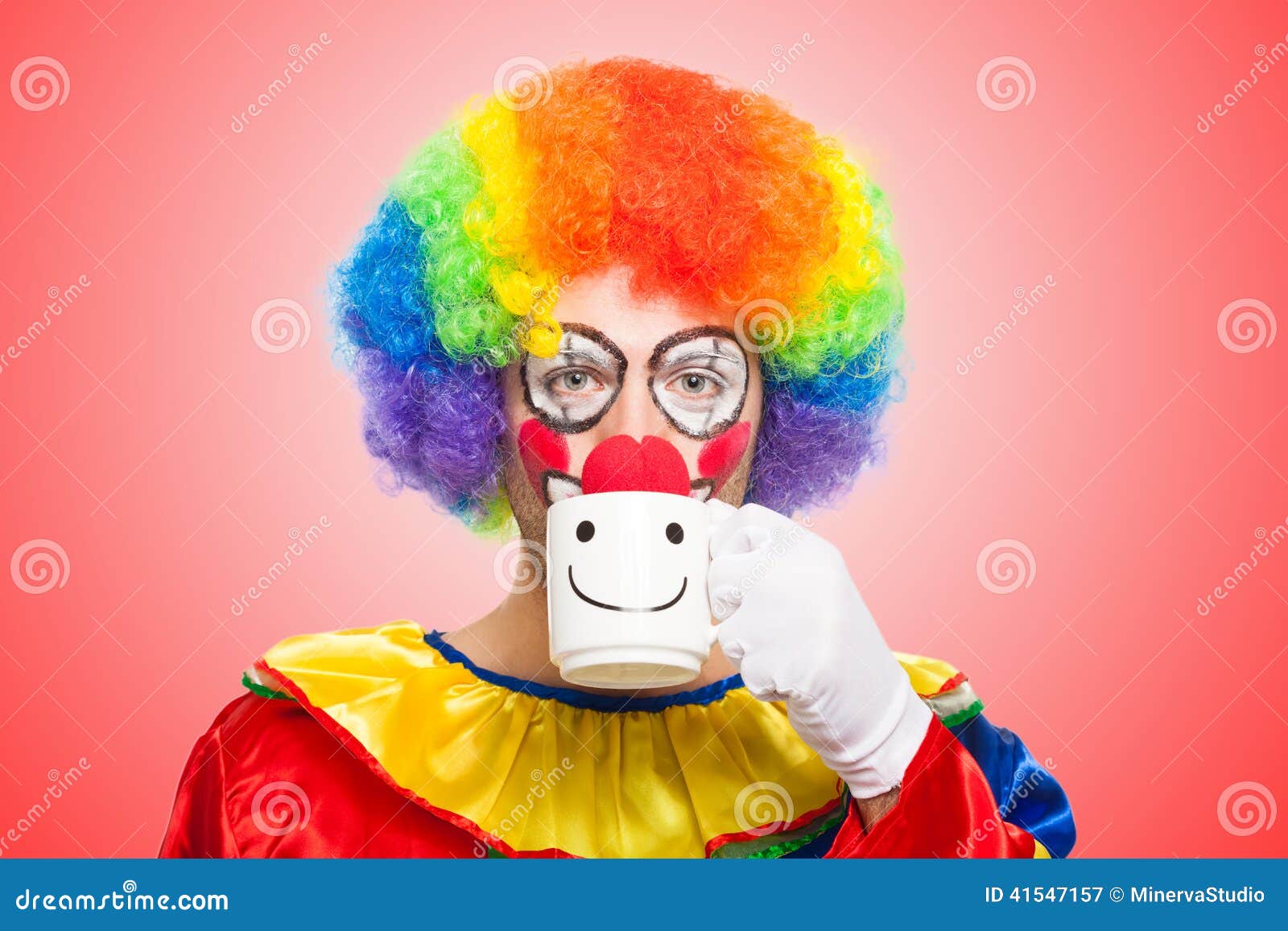 Clown drinking from a cup stock image. Image of character - 41547157