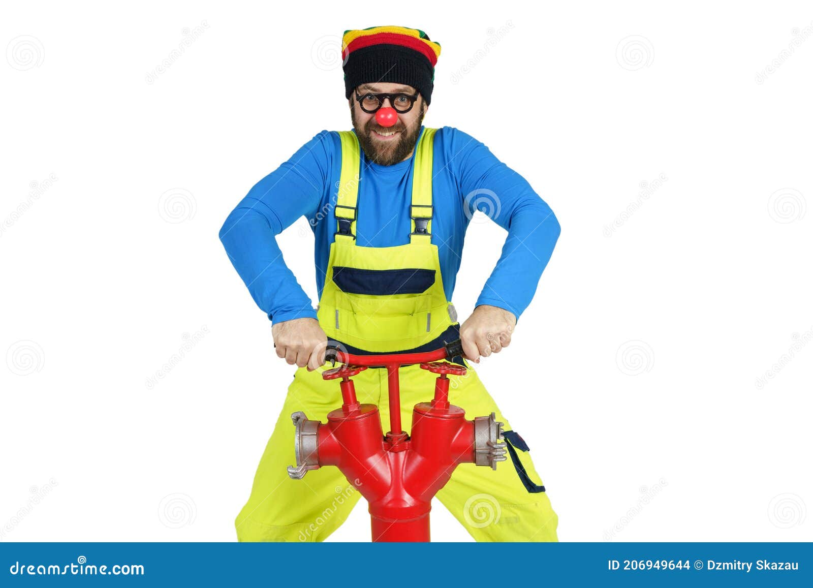 The Clown Fireman Turns the Valve on the Fire Hydrant Stock Photo ...
