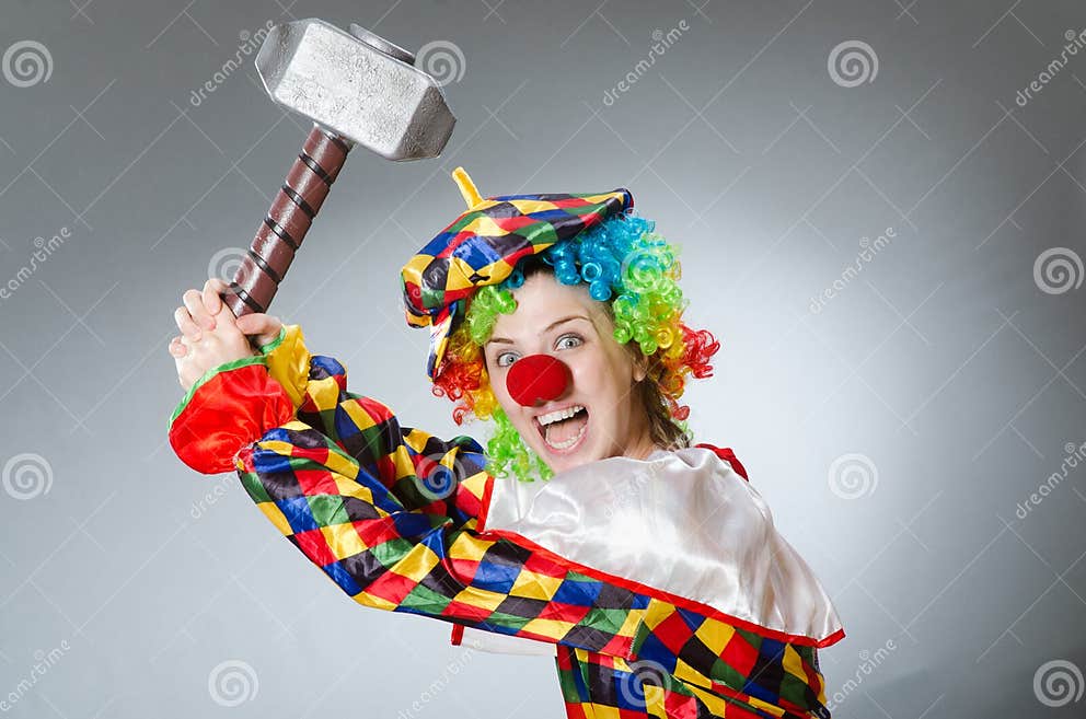 Clown with Hammer in Funny Concept Stock Image - Image of horn, clown ...