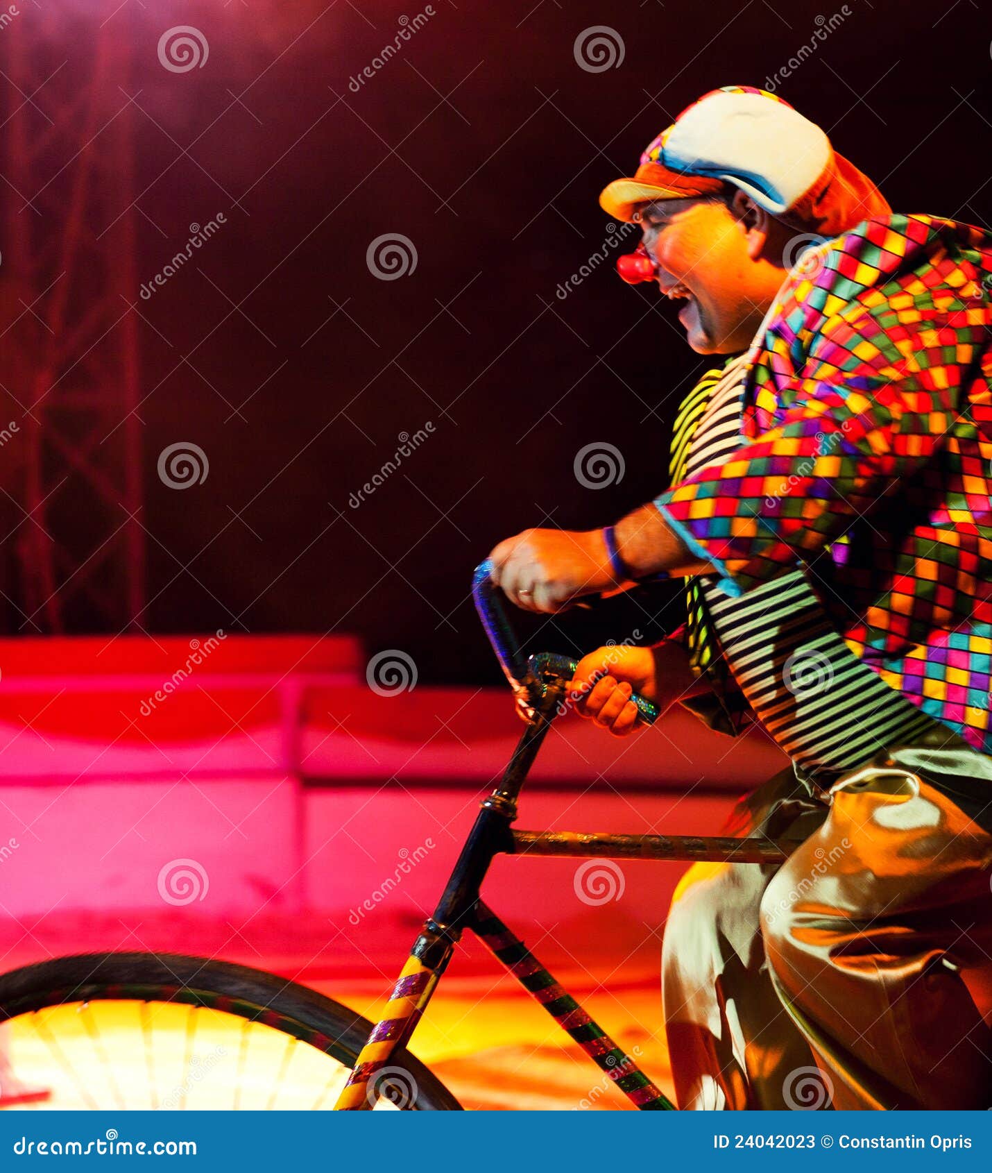 Clown riding bicycle editorial stock photo. Image of curtains - 24042023