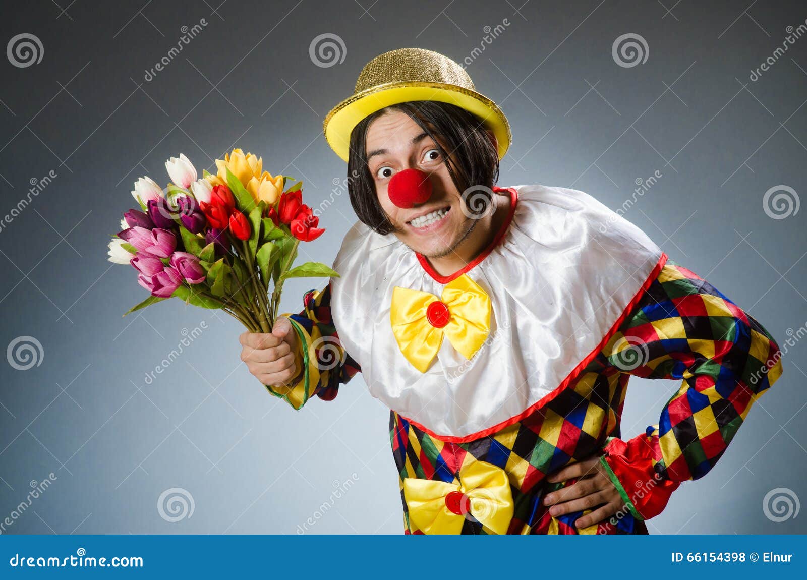 The Clown with Tulip Flowers in Funny Concept Stock Photo - Image of ...