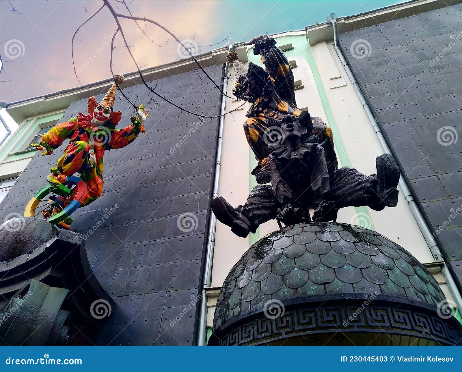 Clowns on the Roof of the Building Stock Image - Image of sculpture ...