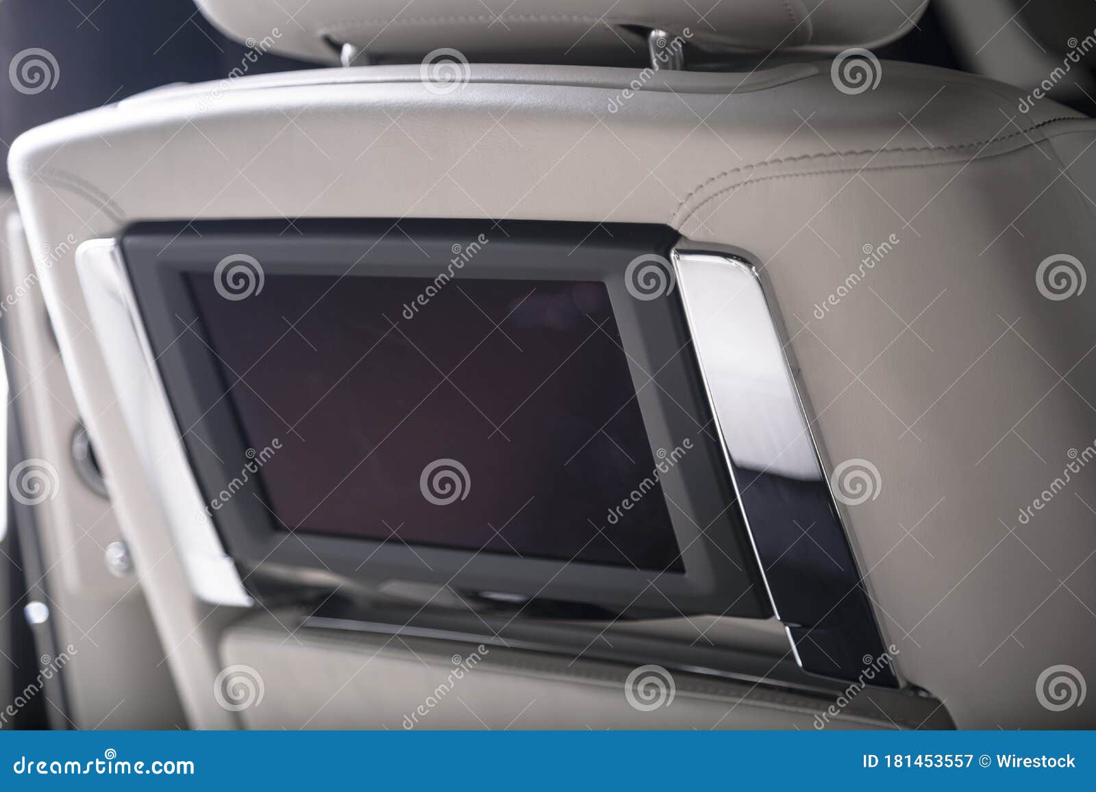 Clsoeup Shot of a Screen on the Back of the Seat in the Modern Car ...