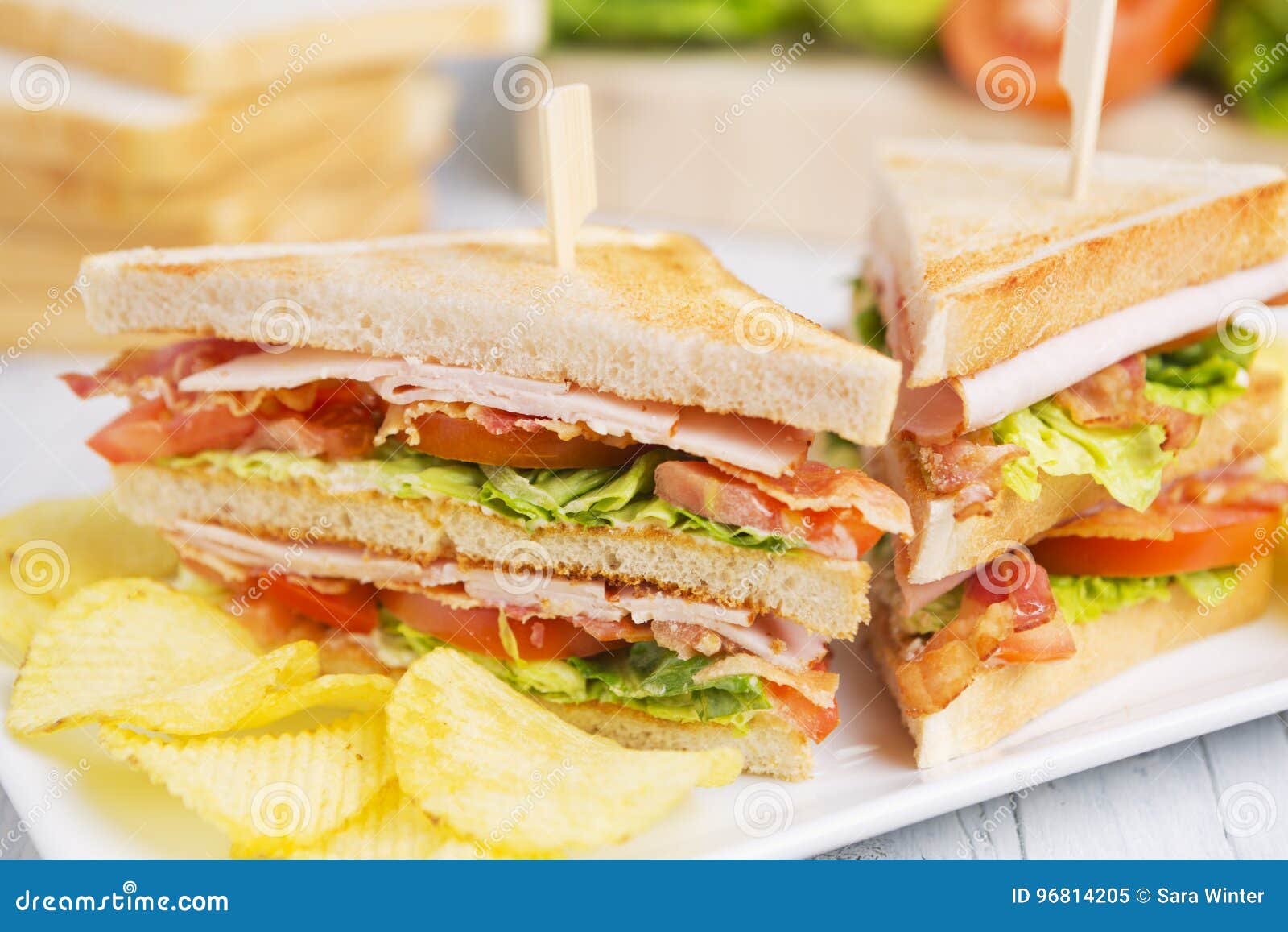 Club Sandwich on a Rustic Table in Bright Light Stock Image - Image of ...