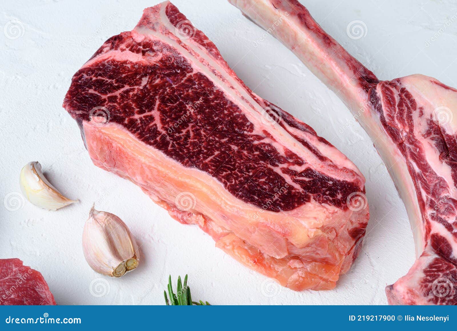 Club Steak Raw Marbled Beef Meat, on White Stone Background Stock Photo ...